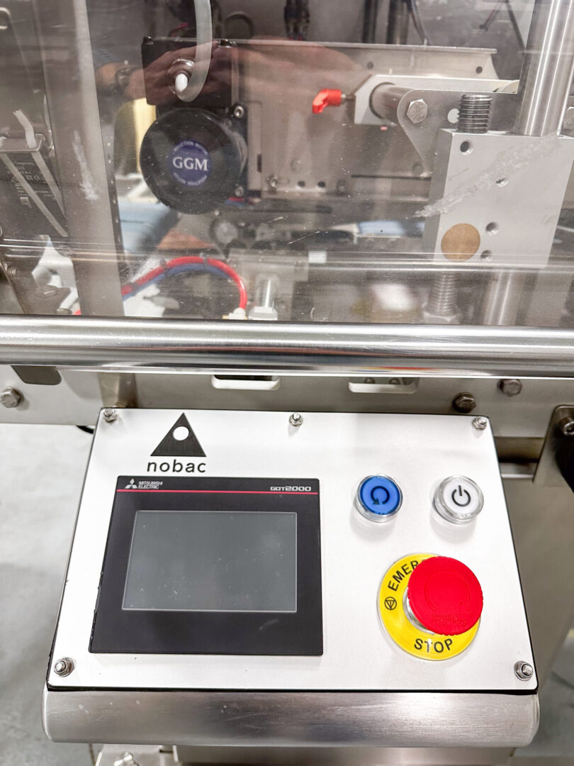 Nobac Tray Labeler Sleever Applicator - Eagle Eye Produce